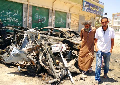 Libyan forces retake Sirte port from IS - Taipei Times