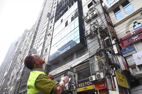 Skyscraper fire toll rises to 25 in Bangladesh - Taipei Times