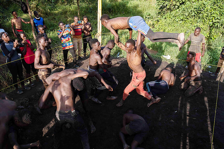 Ugandan wrestlers dream of glory - Taipei Times