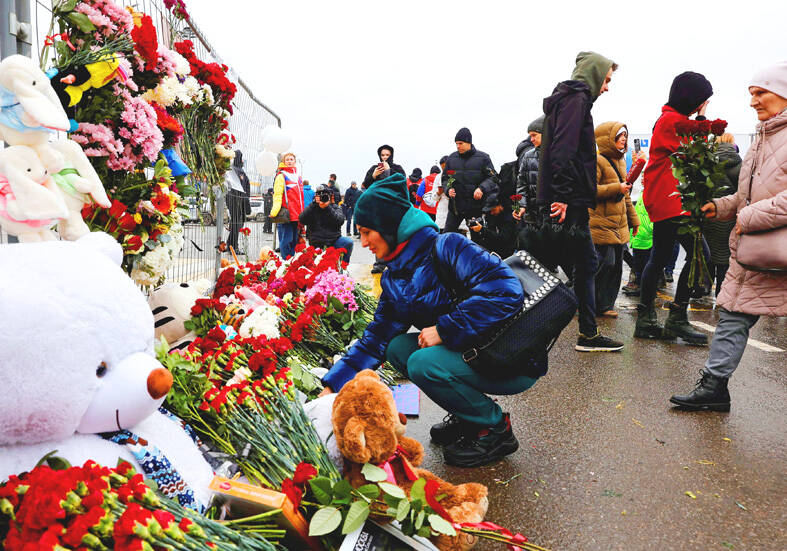 Russia arrests suspected gunmen, as concert shooting death toll rises ...