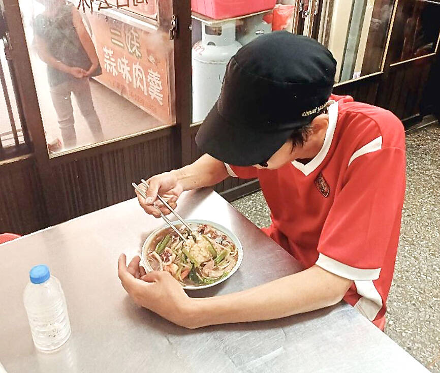 Taichung confirms father of man found living without ID - Taipei Times